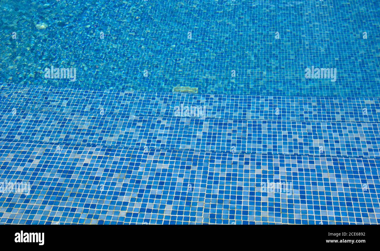 Blue swimming pool in a resort Stock Photo - Alamy