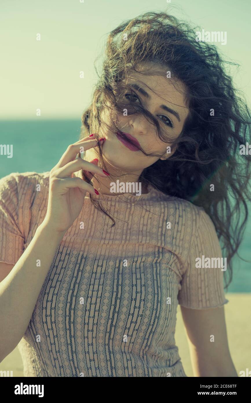 Beautiful woman hair covering face Stock Photo - Alamy