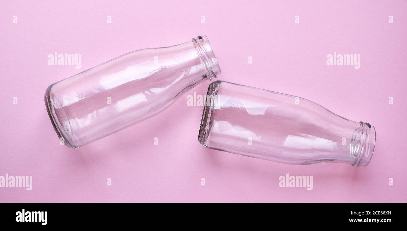 Glass bottles on pink background. Zero waste concept. No plastic free ...