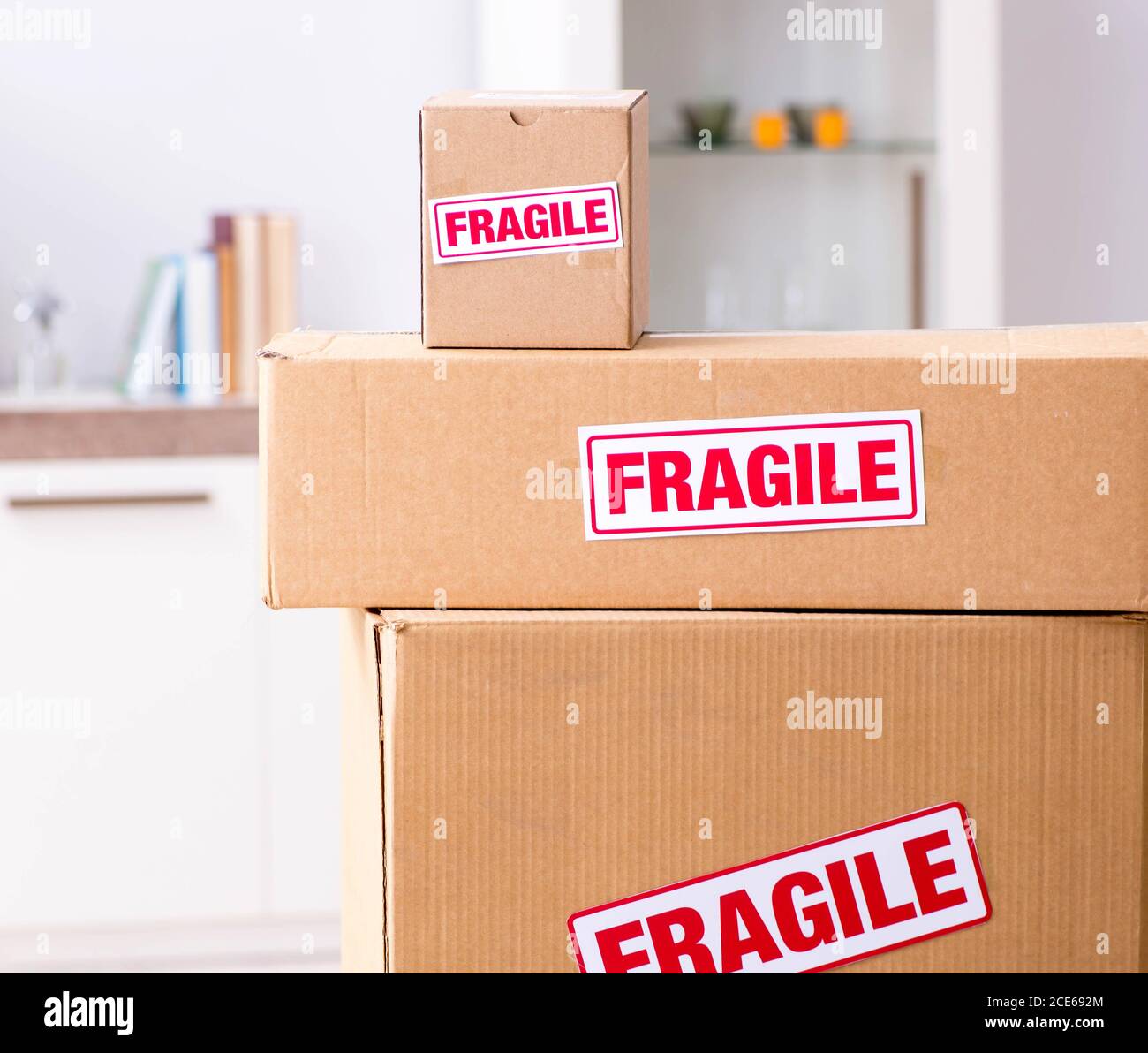 The transportation contractor with fragile boxes Stock Photo - Alamy