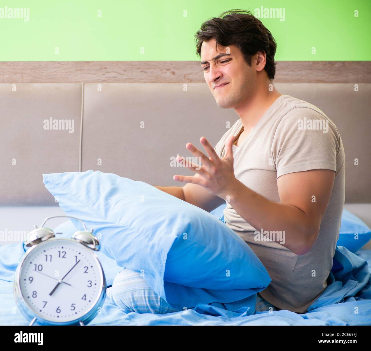 The man having trouble with his sleep Stock Photo - Alamy
