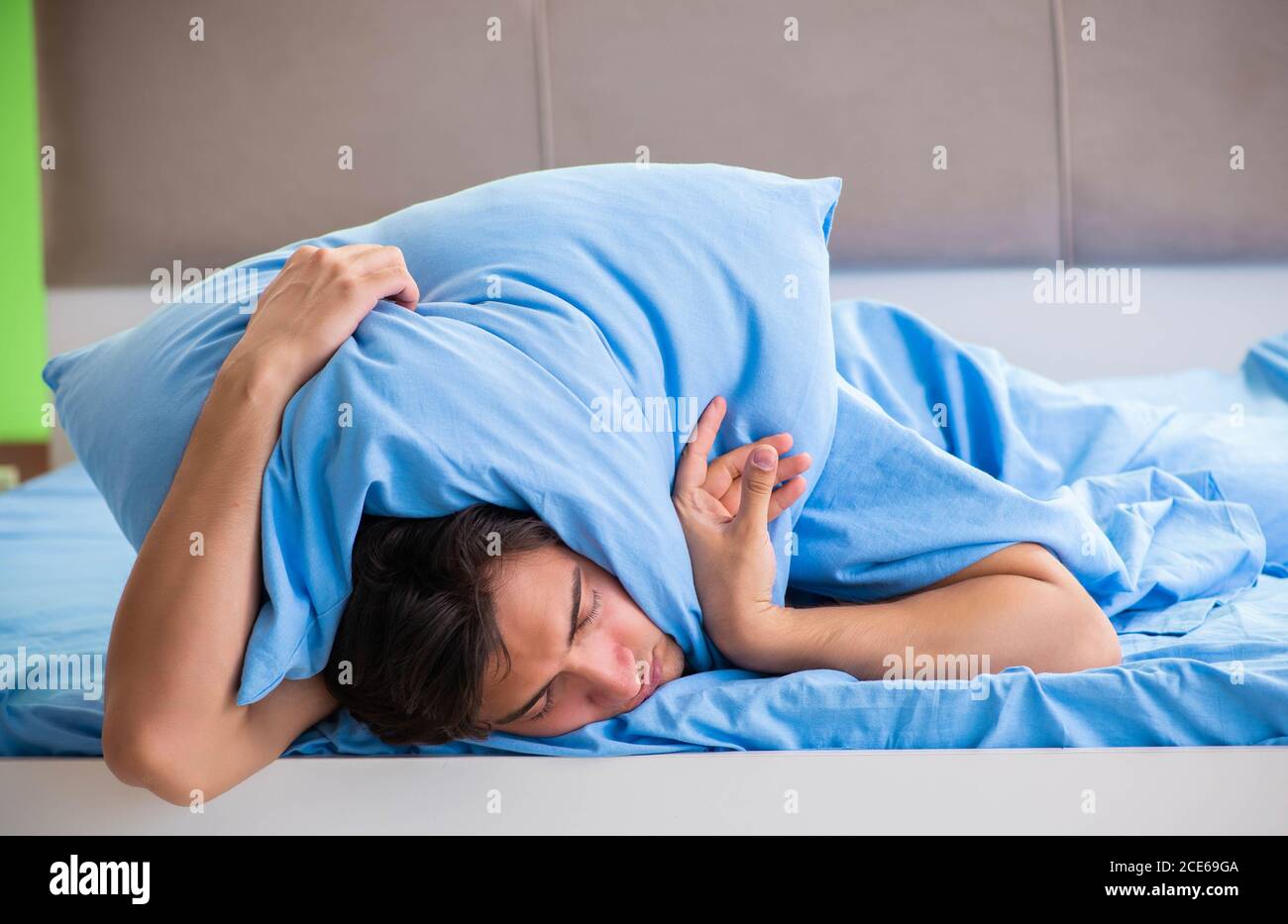 The man suffering from sleeping disorder and insomnia Stock Photo - Alamy
