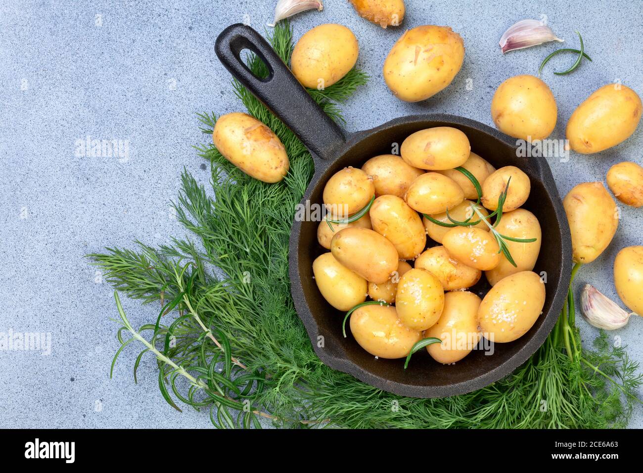 Whole young potatoes for baking Stock Photo - Alamy