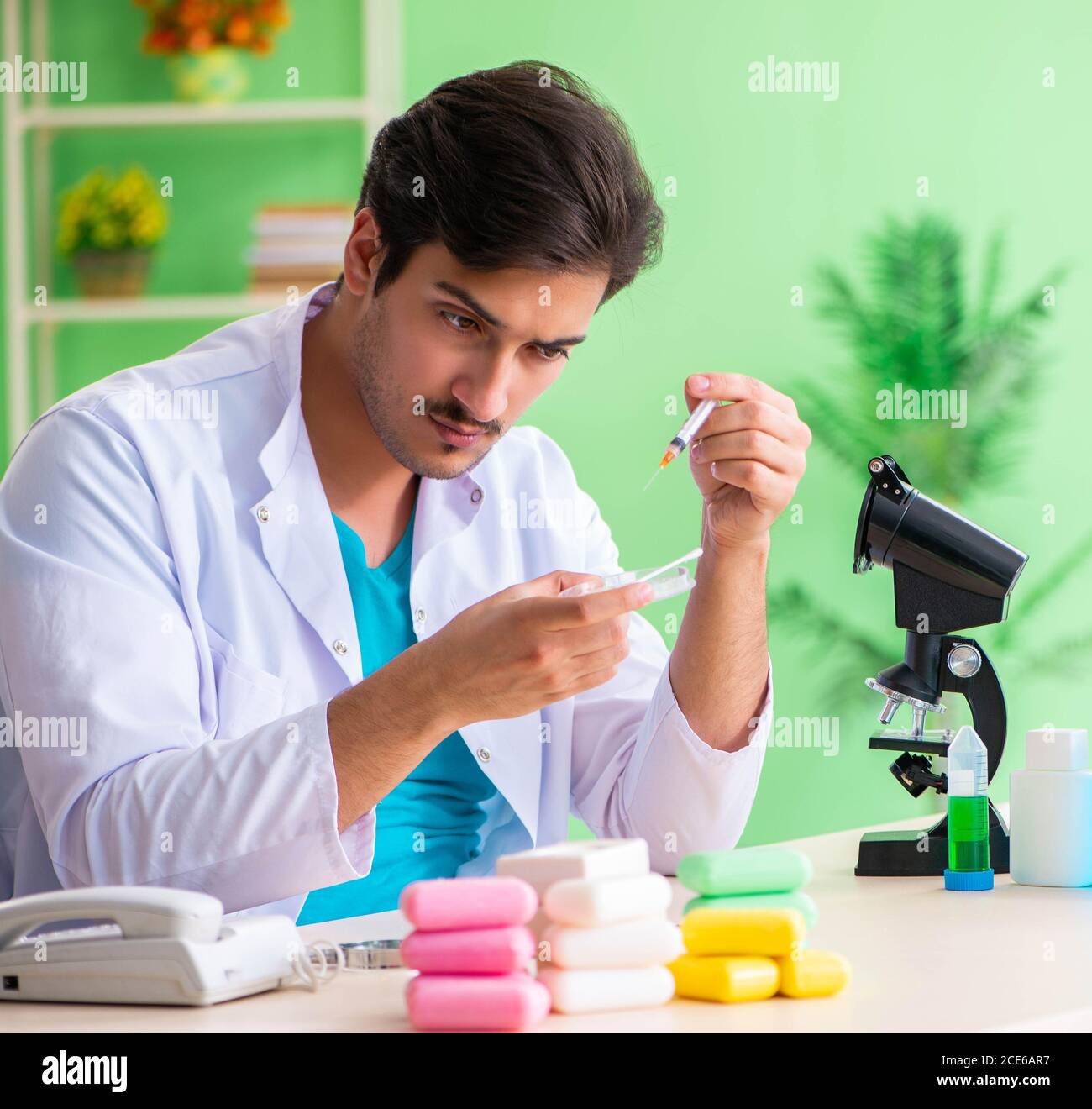 The chemist testing soap in the lab Stock Photo - Alamy