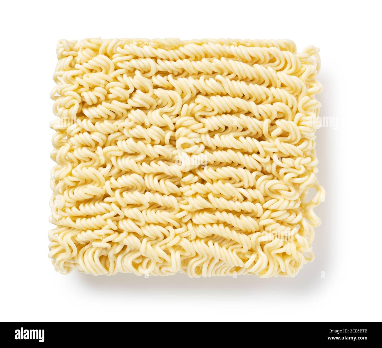 Shot with dry noodles on white background with shadow Stock Photo - Alamy