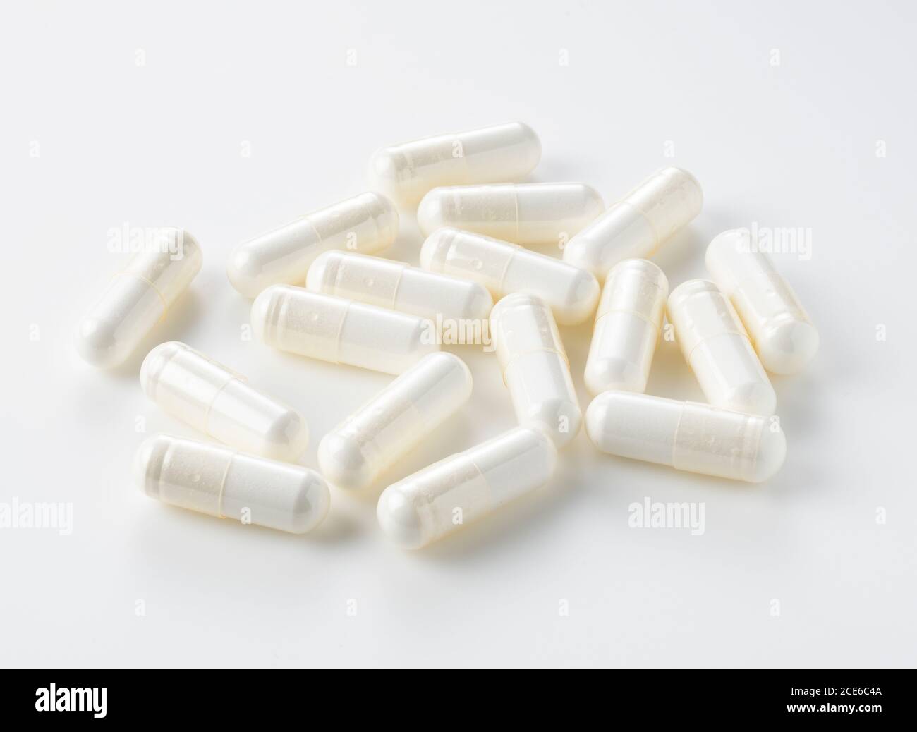 White capsules placed on white background.Medical, health image Stock ...