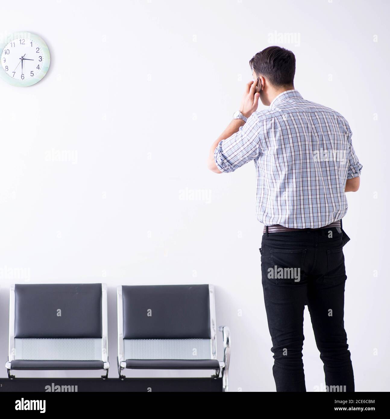 The man nervously impatiently waiting in the lobby Stock Photo - Alamy