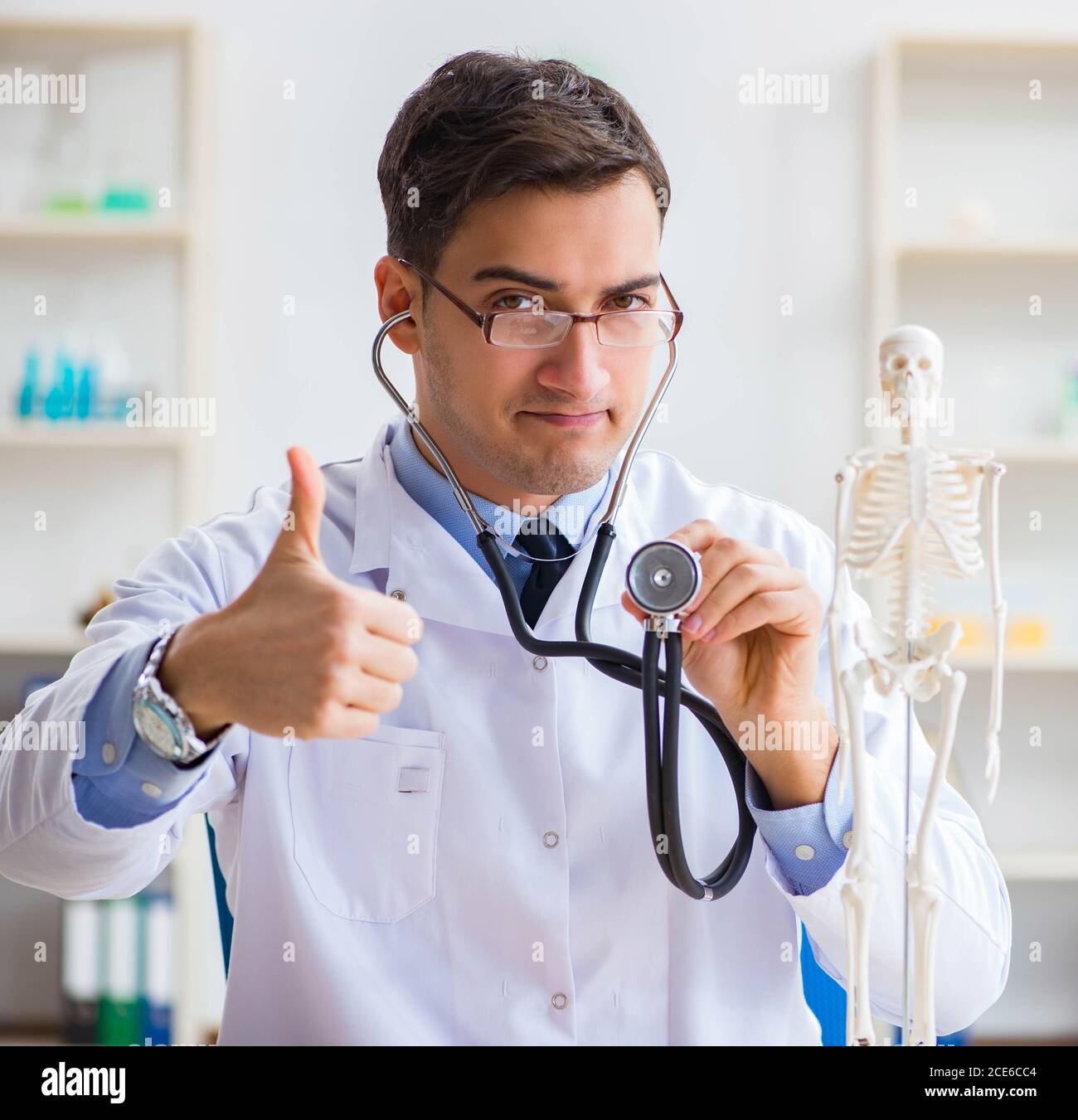 The doctor student studying the bones of skeleton Stock Photo - Alamy