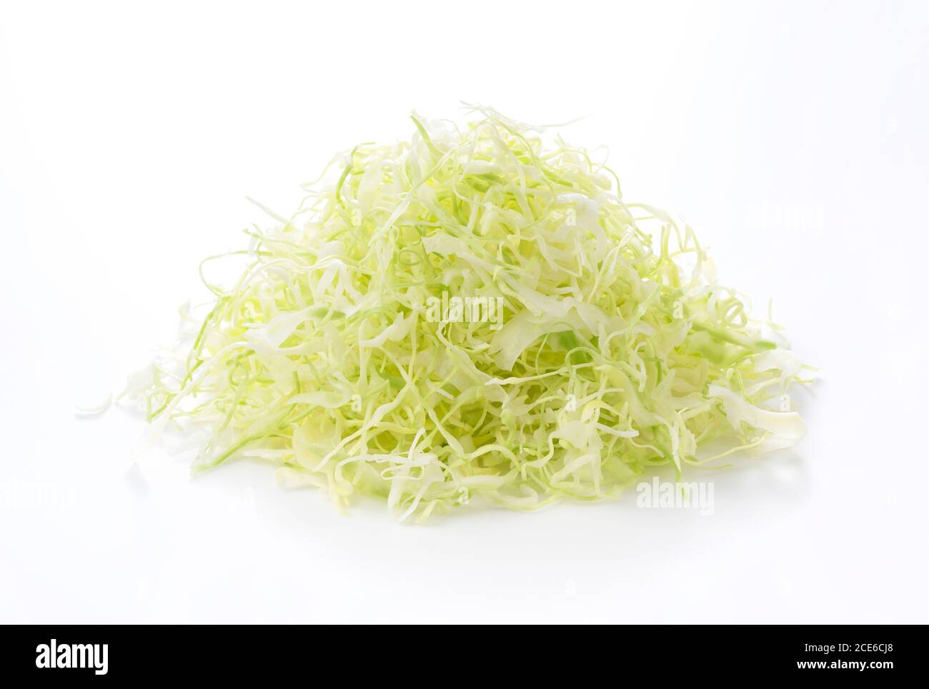 Shooting the shredded cabbage placed on a white background from an ...