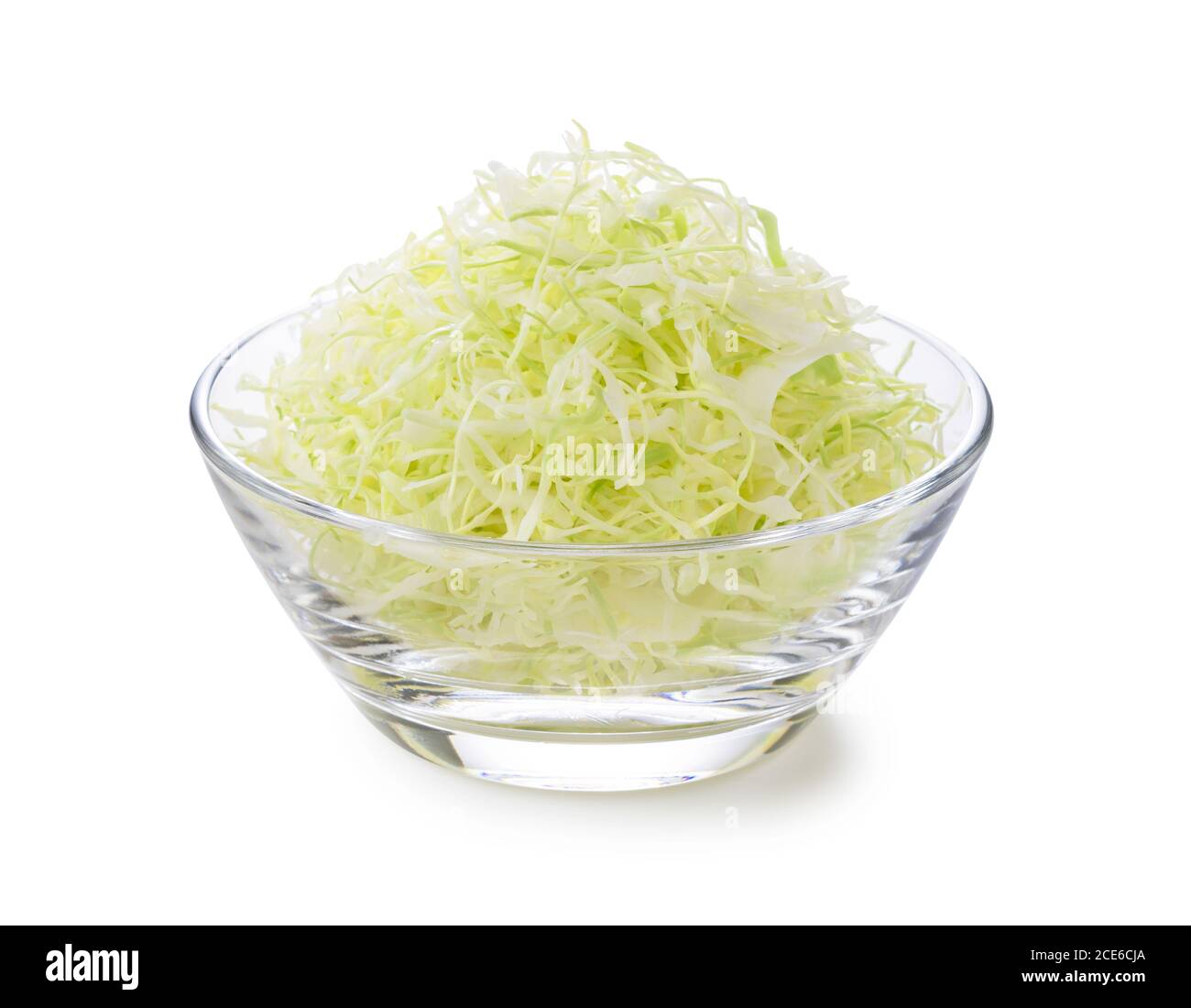 Shooting the shredded cabbage placed on a white background from an ...