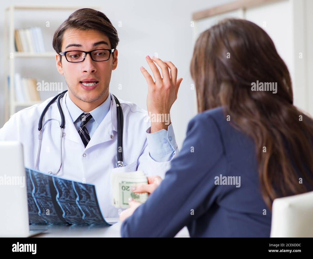 Doctor money envelope hi-res stock photography and images - Alamy