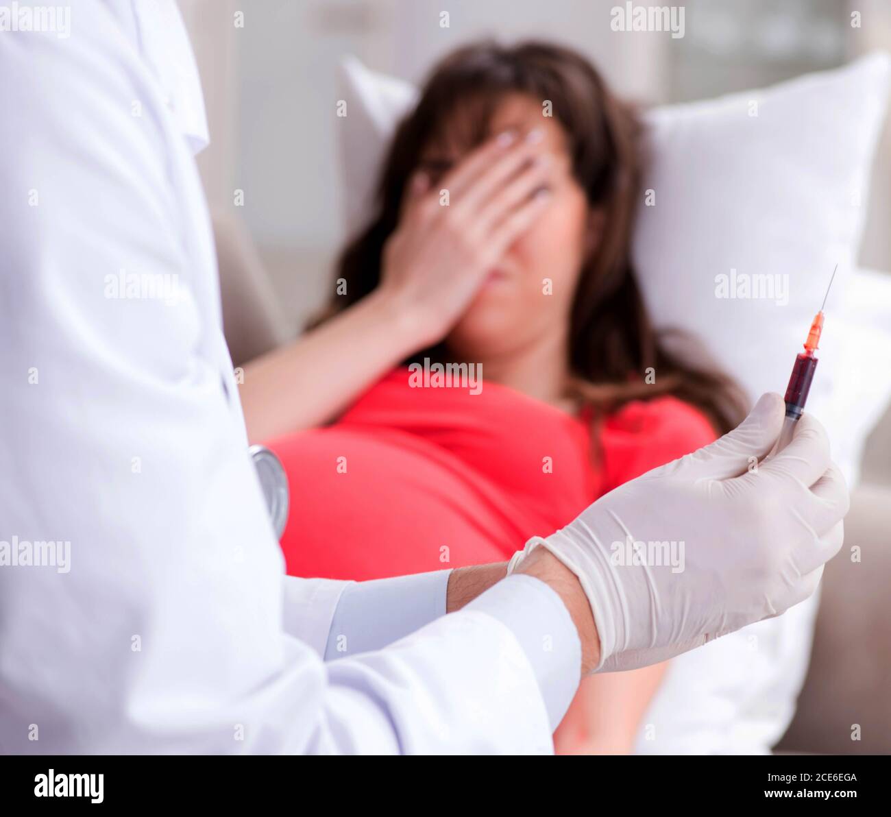 The pregnant woman patient visiting doctor for regular check-up Stock ...