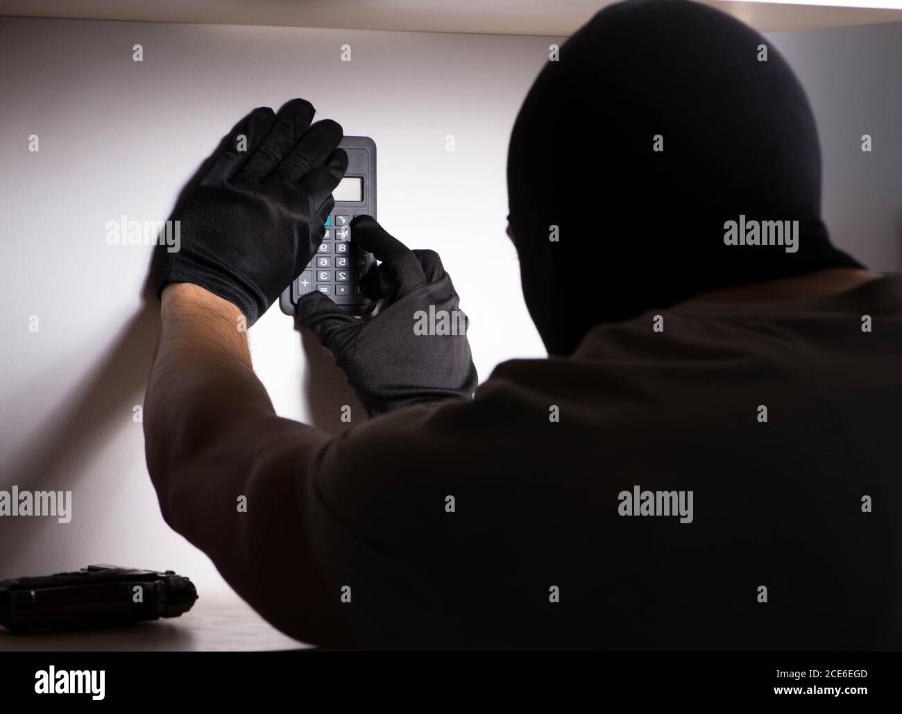 The burglar wearing balaclava mask at crime scene Stock Photo - Alamy