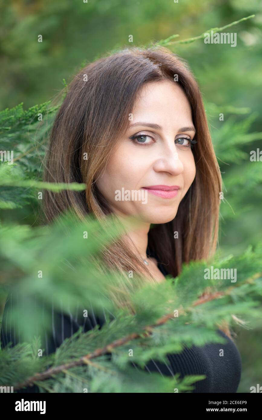 Woman standing in nature hi-res stock photography and images - Alamy