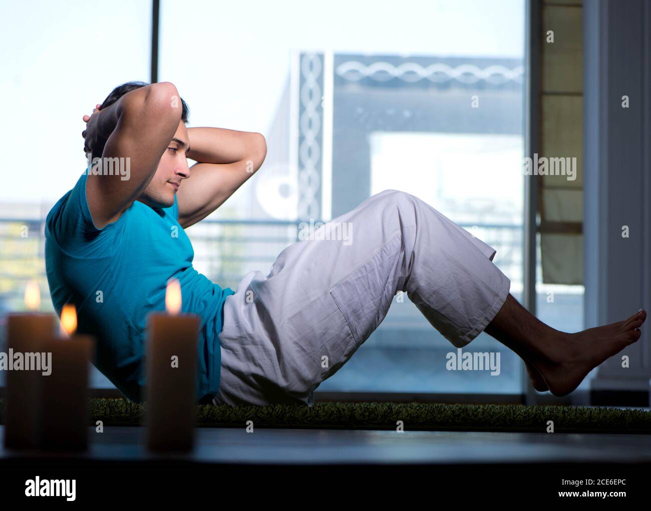 The young handsome man in spa healthcare concept Stock Photo - Alamy