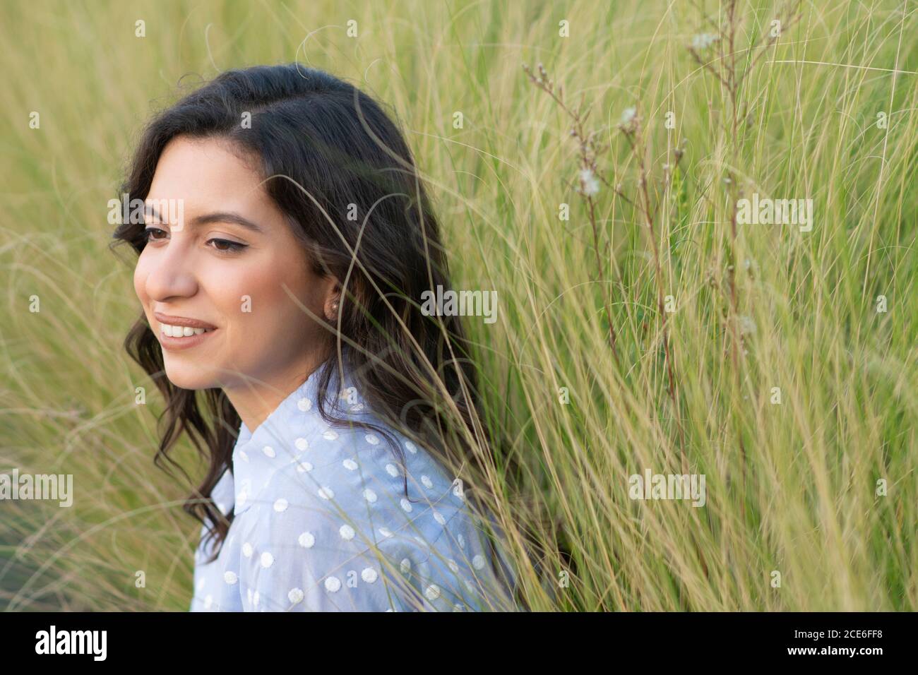 Positive young arab female hi-res stock photography and images - Alamy