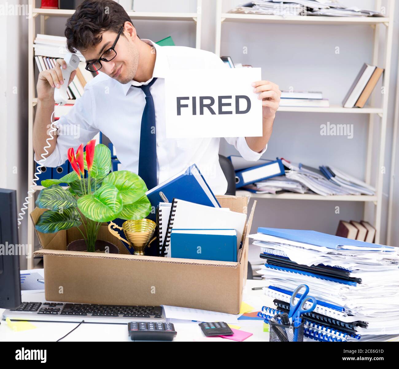 The employee being fired from work made redundant Stock Photo - Alamy