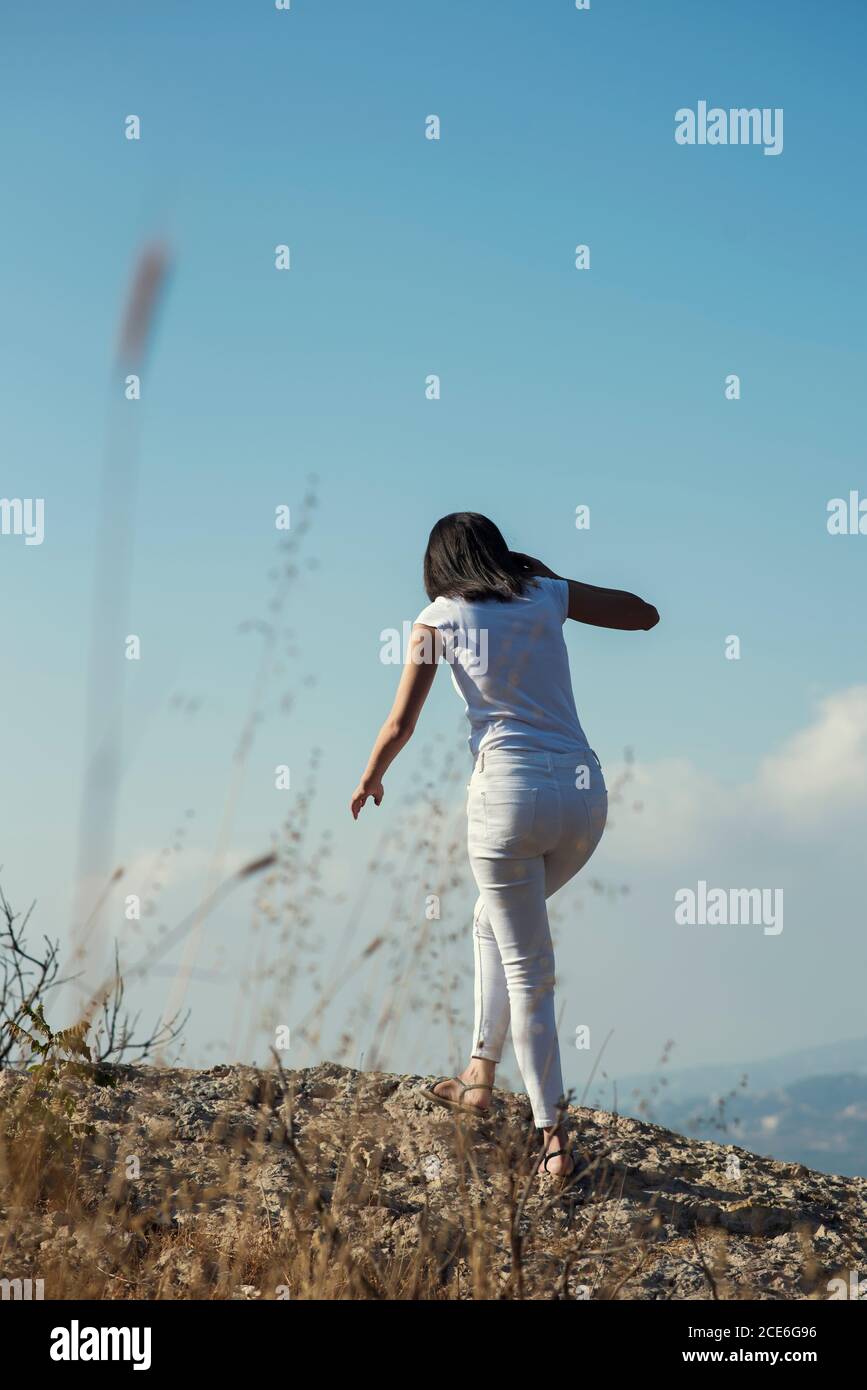 Woman back view profile walking hi-res stock photography and images - Alamy
