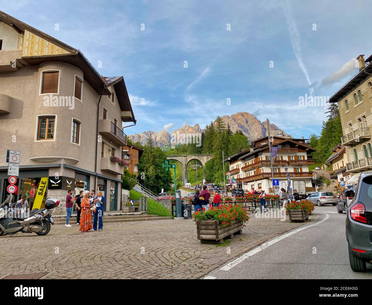 CORTINA, ITALY - AUGUST 2020: Tourists along city streets in summer ...