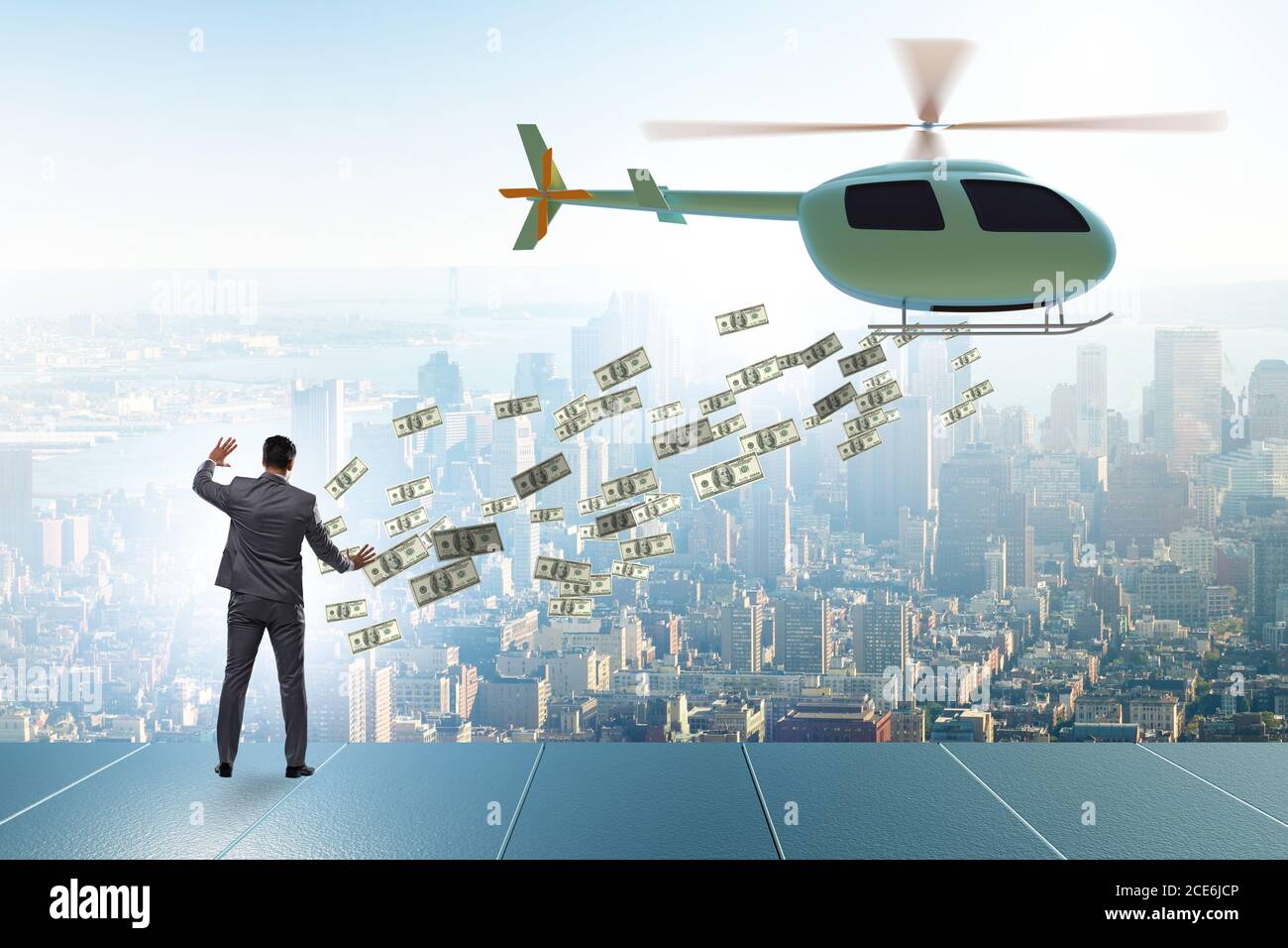 Helicopter money concept with the businessman Stock Photo - Alamy