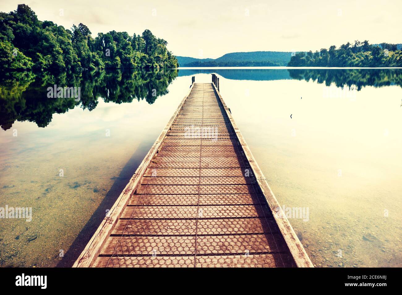 Pier on the lake Stock Photo - Alamy