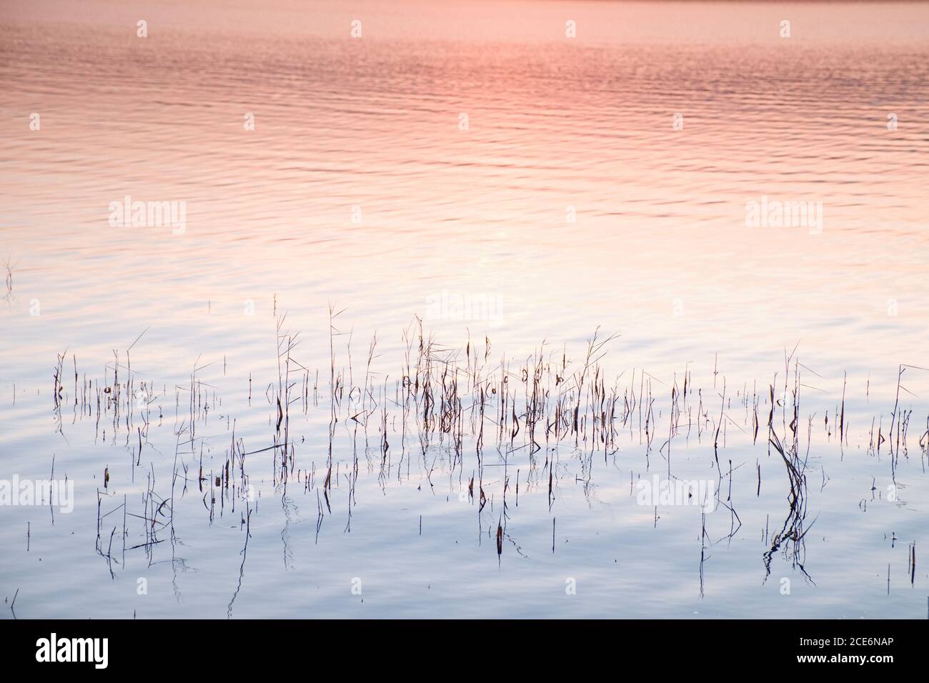 Beautiful autumn sunrise or sunset with Reflection on Lake water level ...