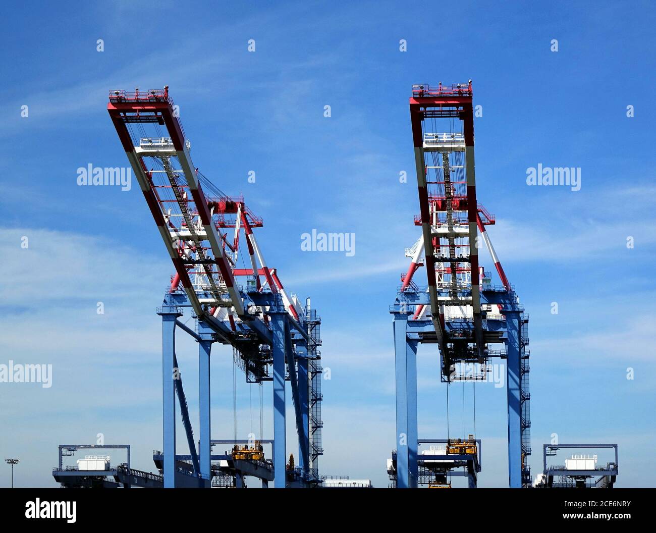 Large cranes used for loading containers on to ships Stock Photo - Alamy