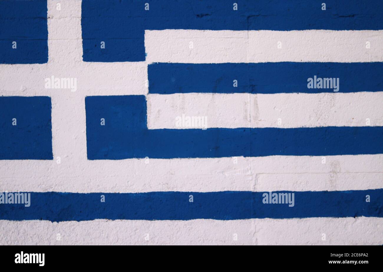 Greek flag painted on a wall Stock Photo - Alamy