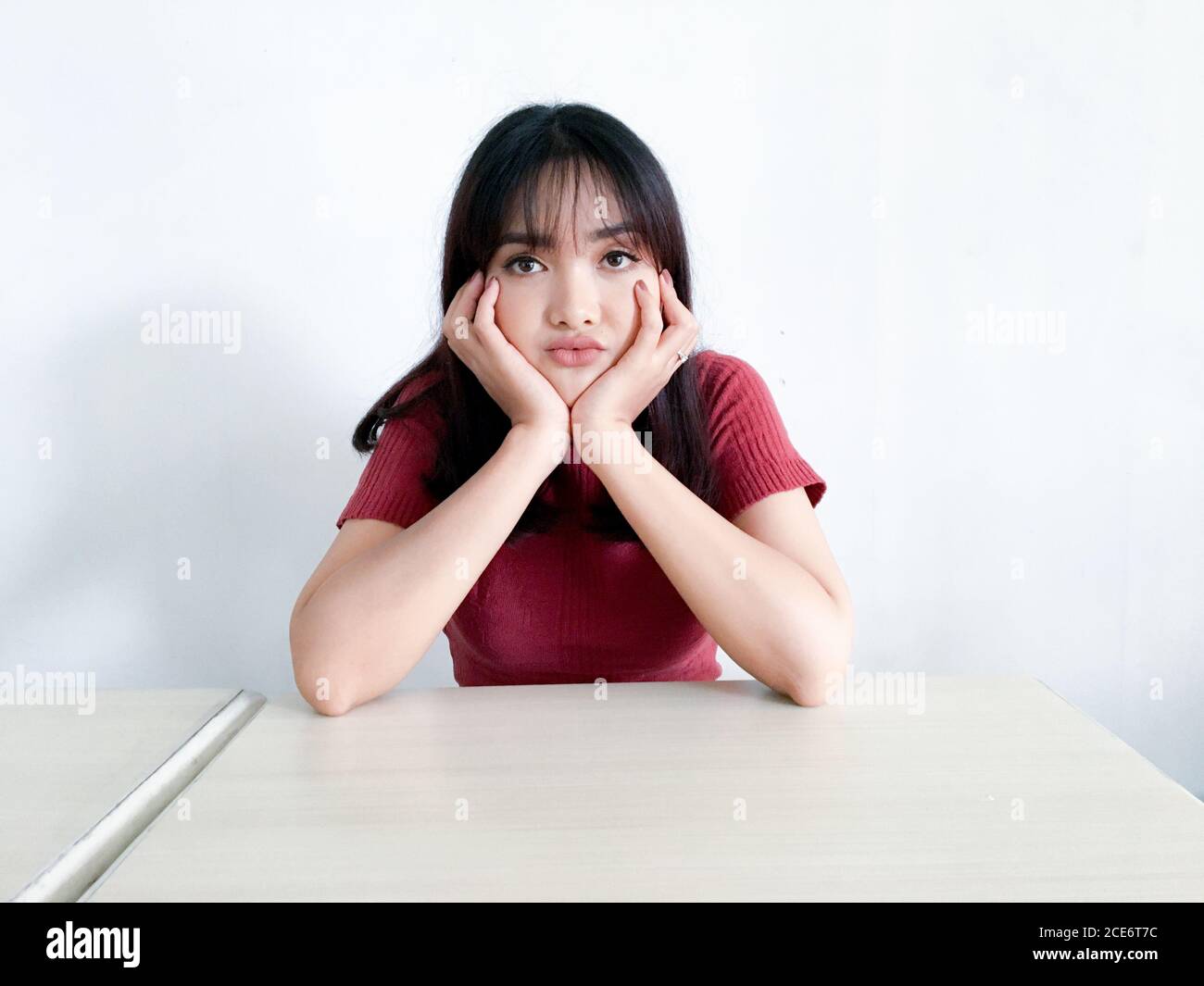 Beautiful Asian girl is mad and boring isolated on white background ...