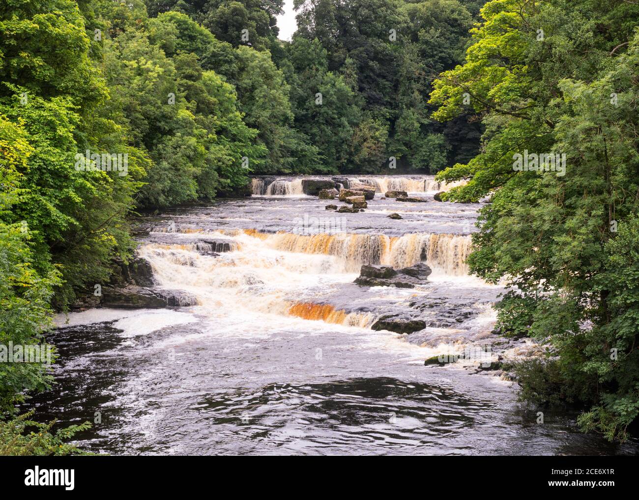 Aysgarth Falls with the river Ure in spate after heavy rain, Yorkshire ...