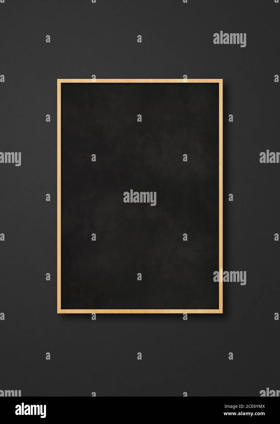 Traditional blackboard isolated on a black background. Blank vertical ...