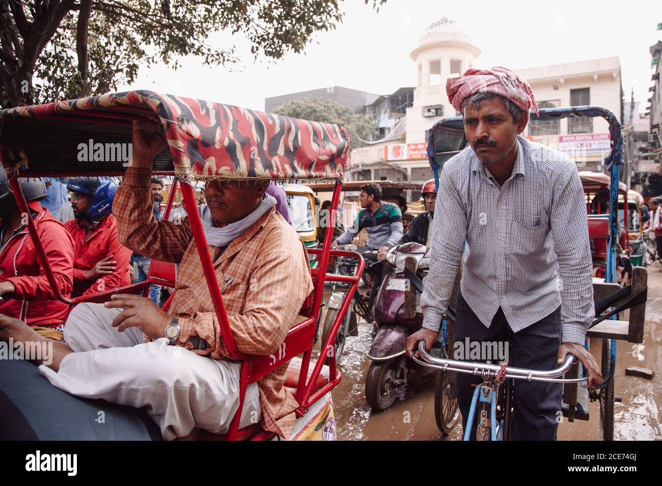 India - November 9, 2012: Indian people on dirty road in different ...