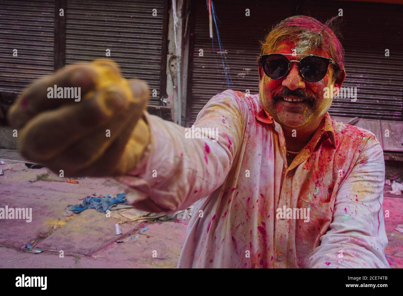 Indian man holi festival enjoy hi-res stock photography and images - Alamy
