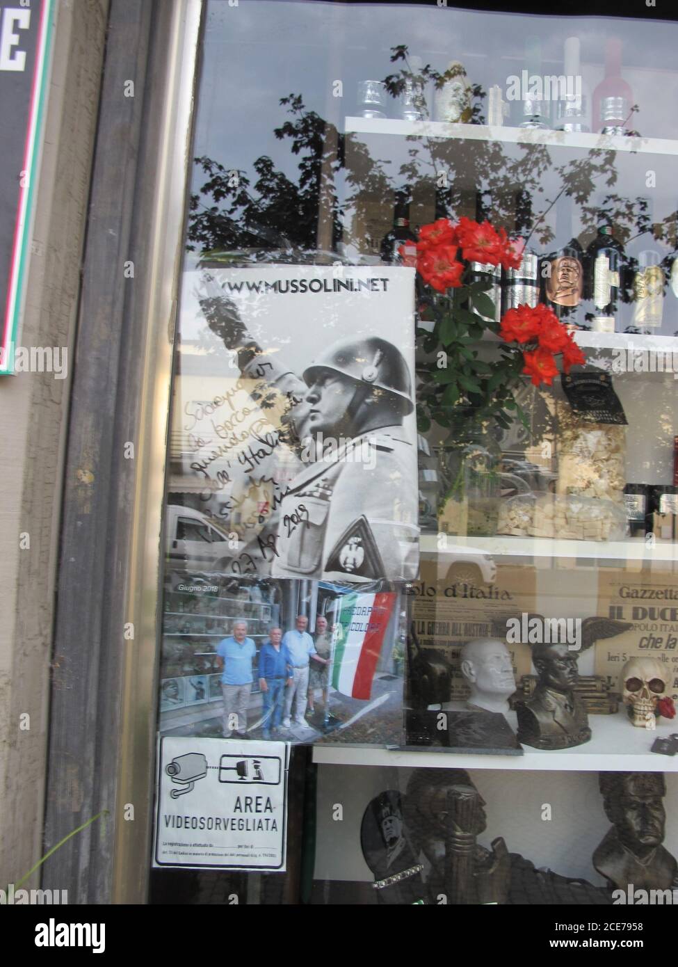 Predappio, Italy. 12th Aug, 2020. In a shop window are busts of ...
