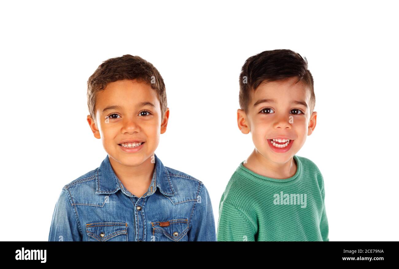 Two latin children isolated on a white background Stock Photo - Alamy