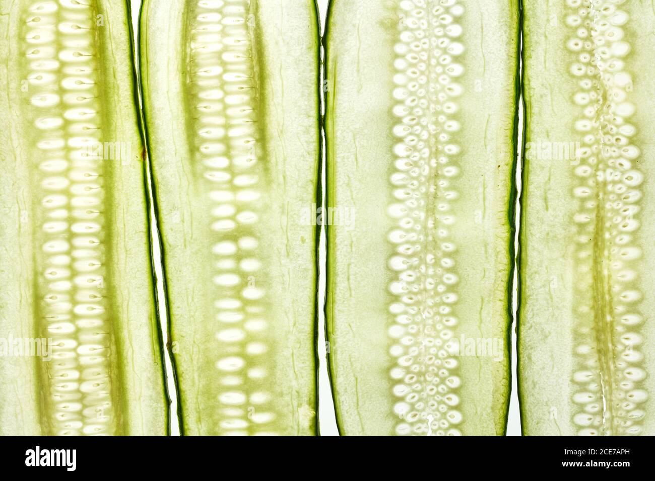 Vertical cut cucumber vegetable slices natural background Stock Photo ...