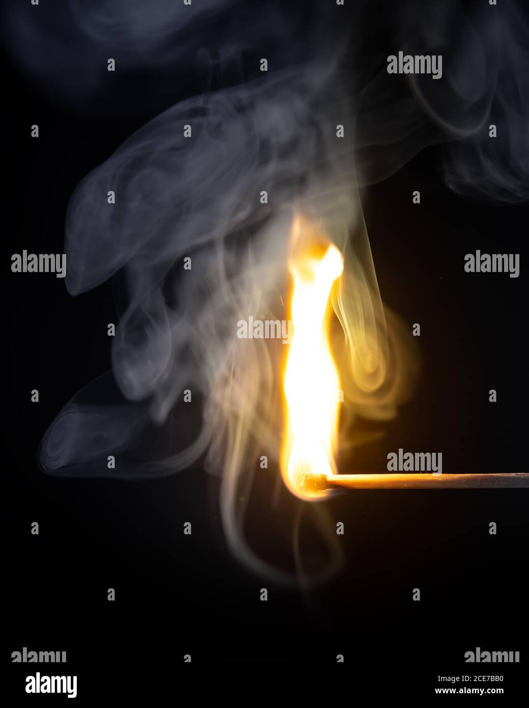 match flame dark background Stock Photo - Alamy