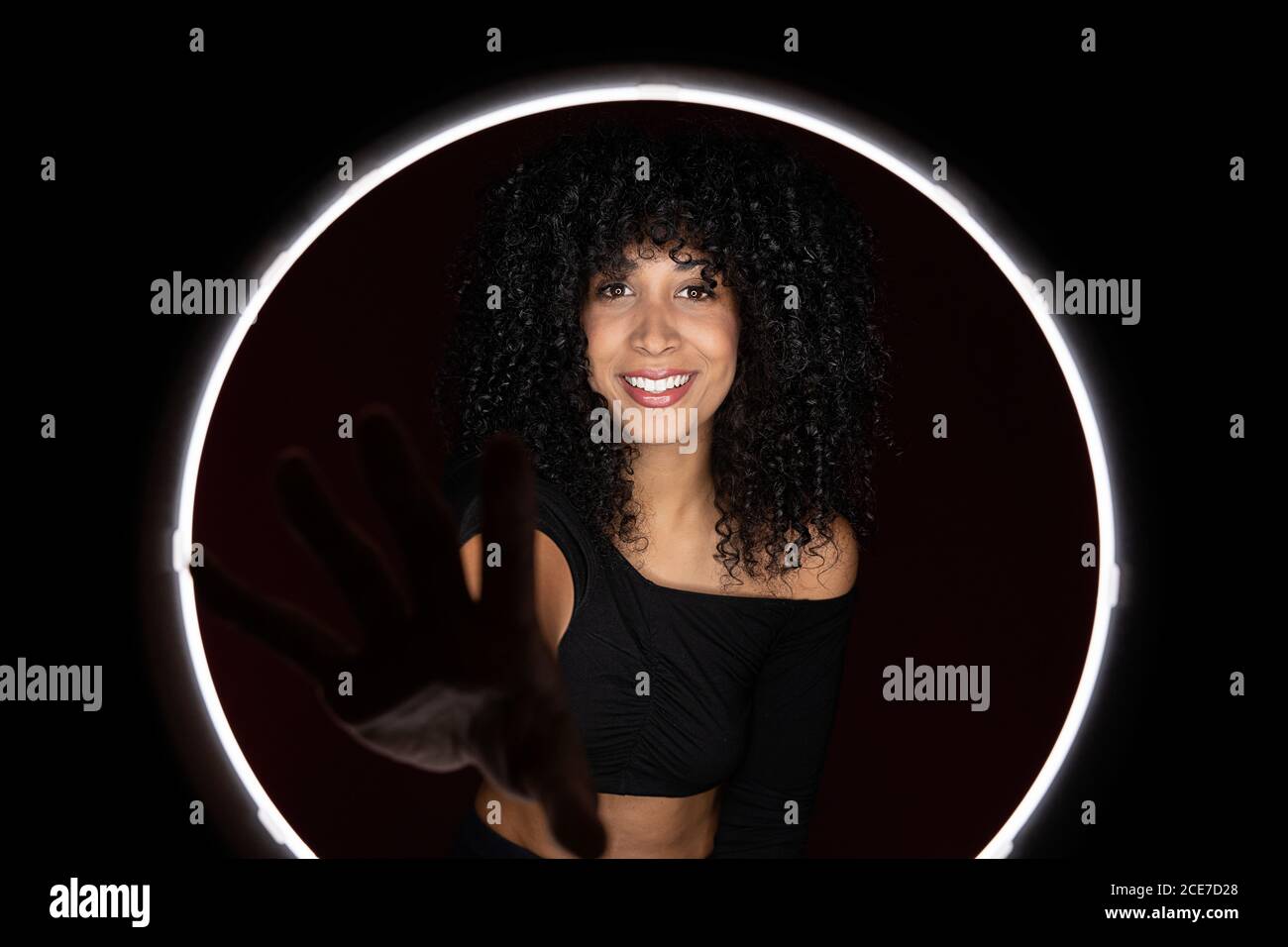 Reaching hand towards camera woman hi-res stock photography and images ...