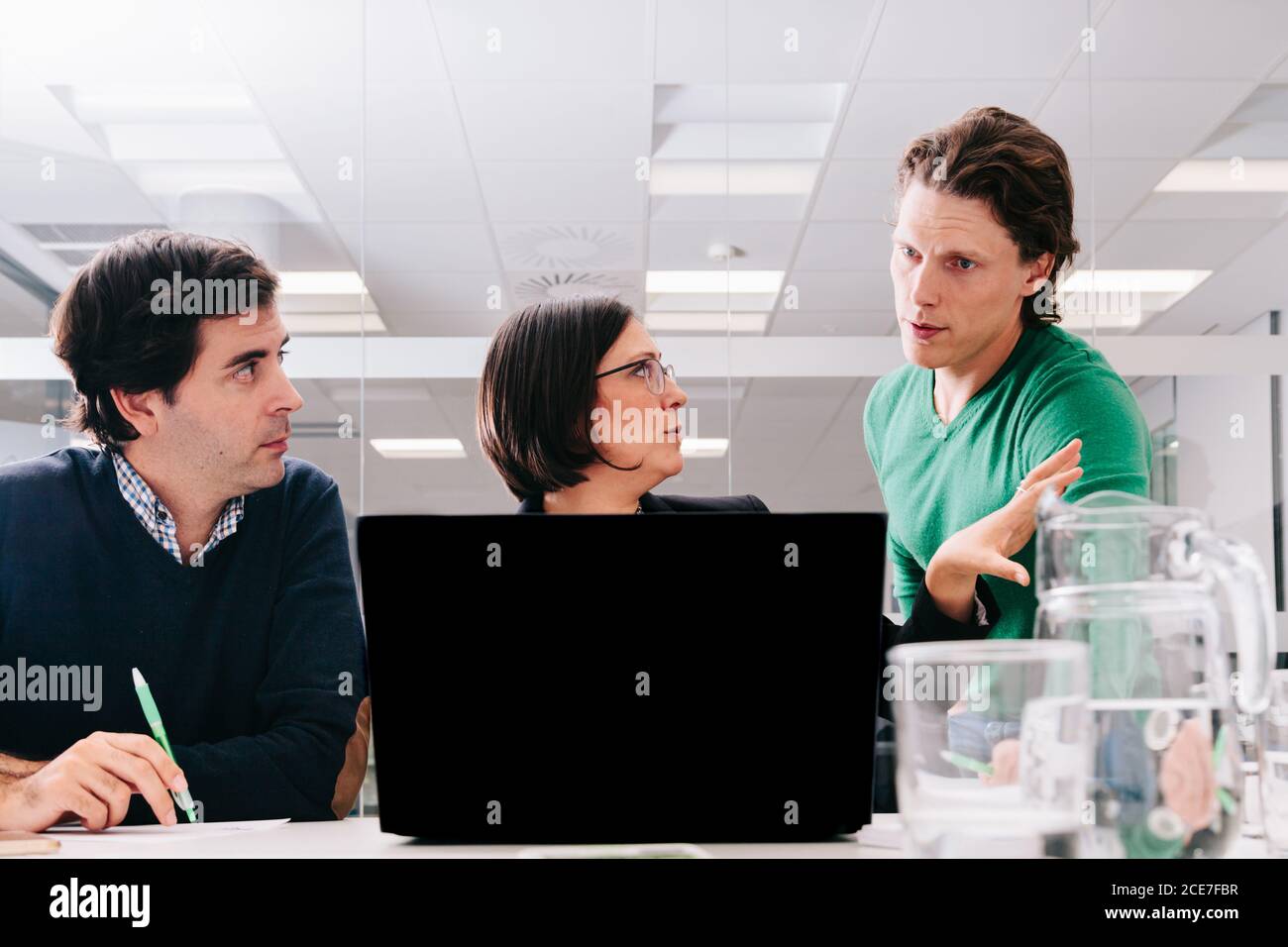 Office Workers Around Table High Resolution Stock Photography and ...