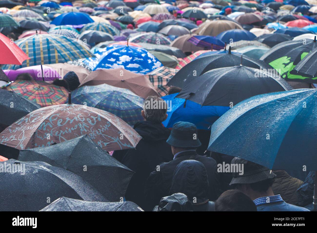 Crowd with umbrellas hi-res stock photography and images - Alamy