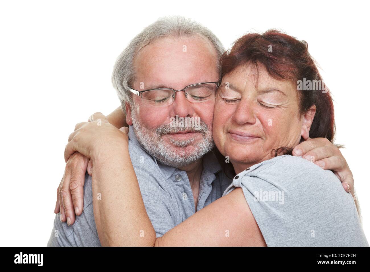 Two seniors cuddle their cheeks together Stock Photo - Alamy