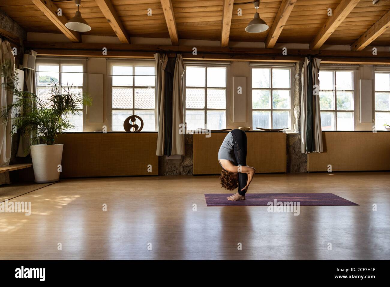 Standing forward bend pose hi-res stock photography and images - Alamy