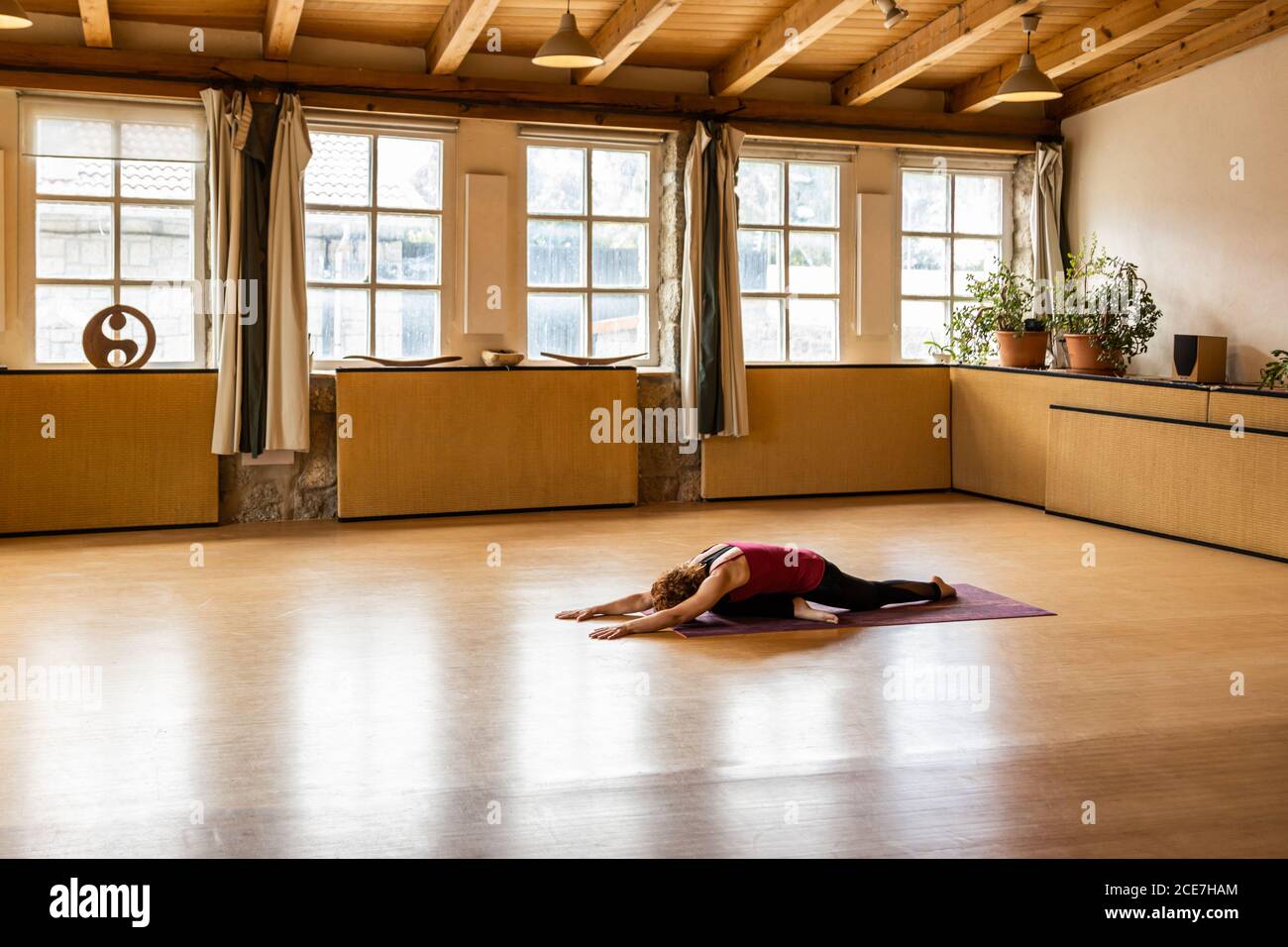 Full body side view of unrecognizable focused female in sportswear ...