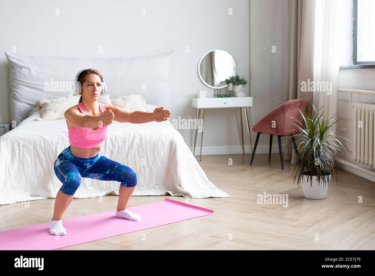 Woman squatting room hi-res stock photography and images - Alamy