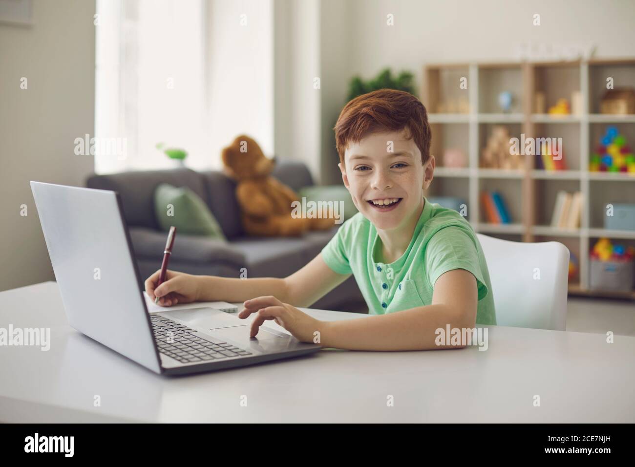 Child portrait write homework hi-res stock photography and images - Alamy