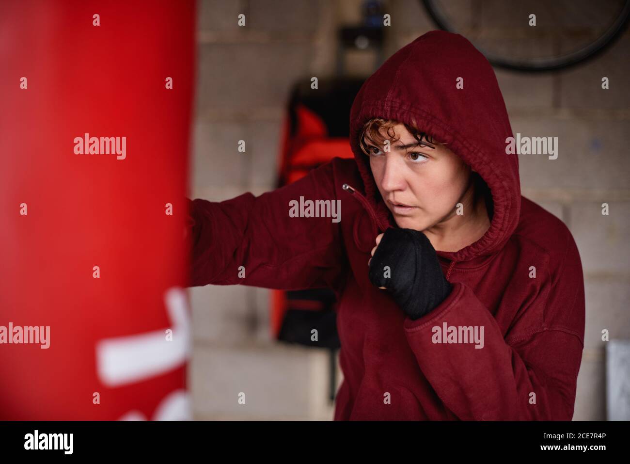 Determined sportsWoman shadow boxing in gym Stock Photo - Alamy