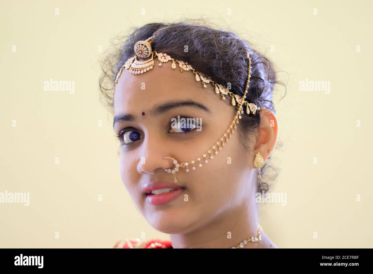 ,A beautiful young Hindu woman face and wore gold ornaments , indian ...