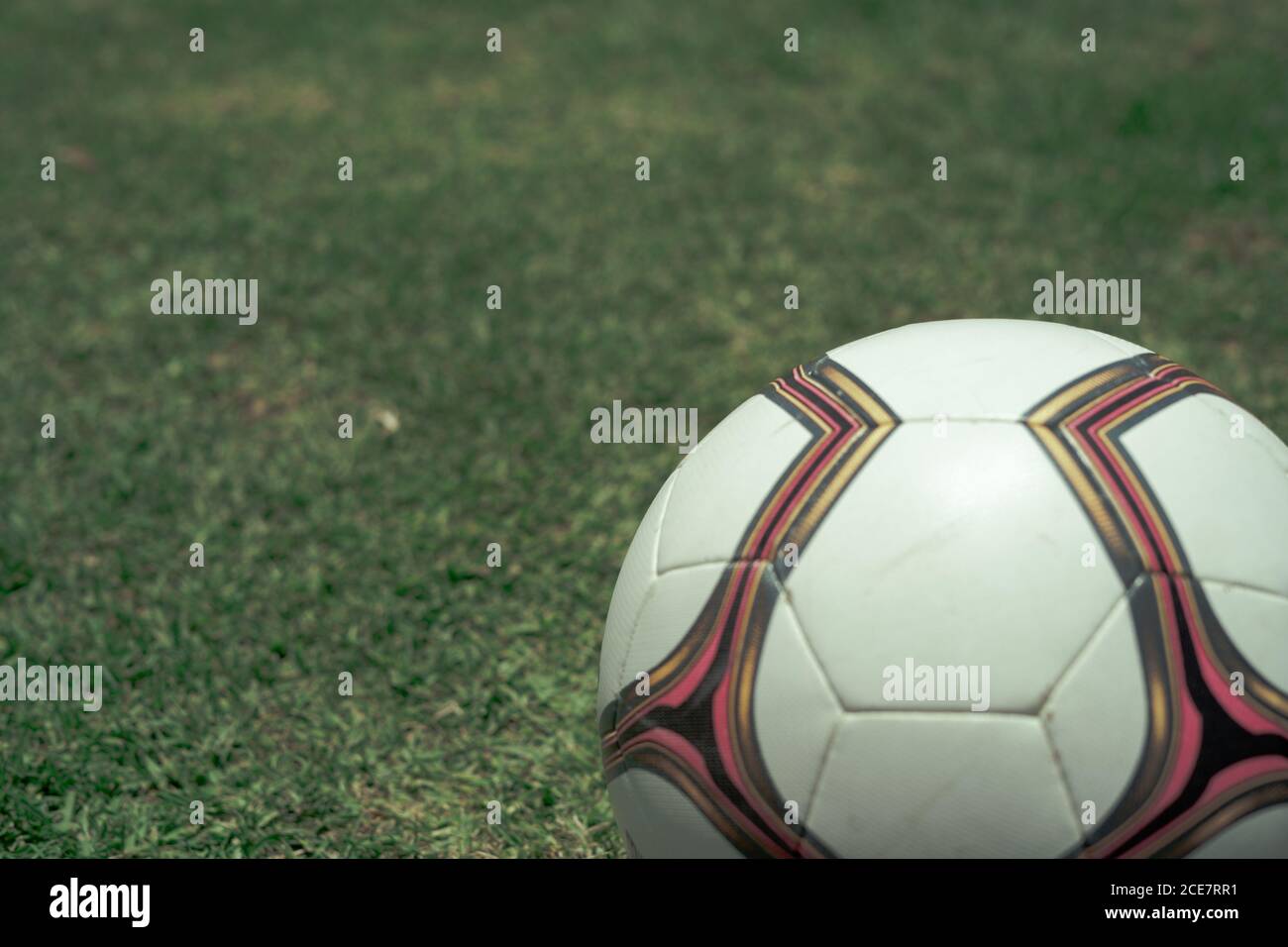Closeup shot of a football ball on a field lawn Stock Photo - Alamy