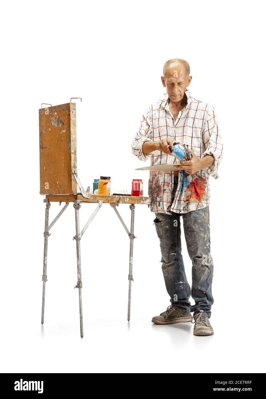 Male caucasian artist, painter at work isolated on white studio ...