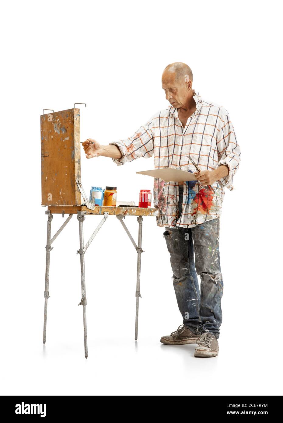 Male caucasian artist, painter at work isolated on white studio ...